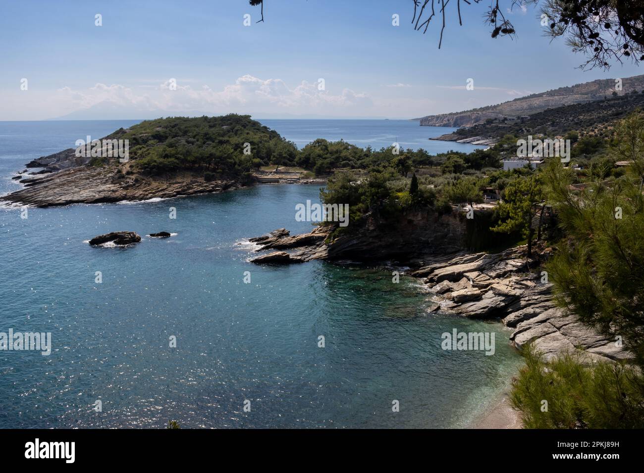 View from the hill on the coast and peninsula. Calm Aegean sea. A lot ...