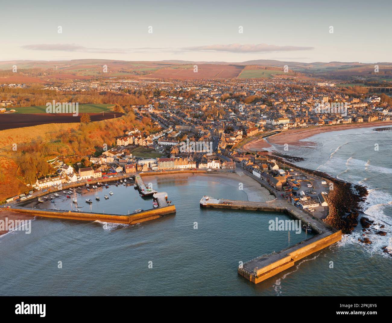 Stonehaven harbour and town at sunrise during the summer Stock Photo ...