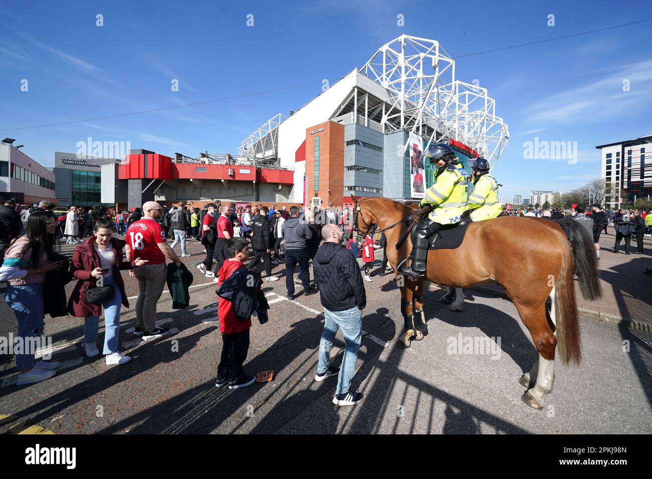 Mounted police speak to fans outside the stadium ahead of the Premier ...