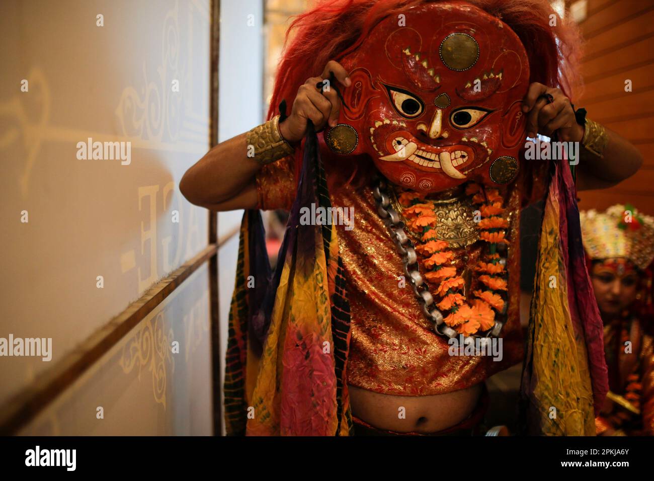 Kathmandu, Nepal. 8th Apr, 2023. A man dressed as a Lakhey gets ready ...
