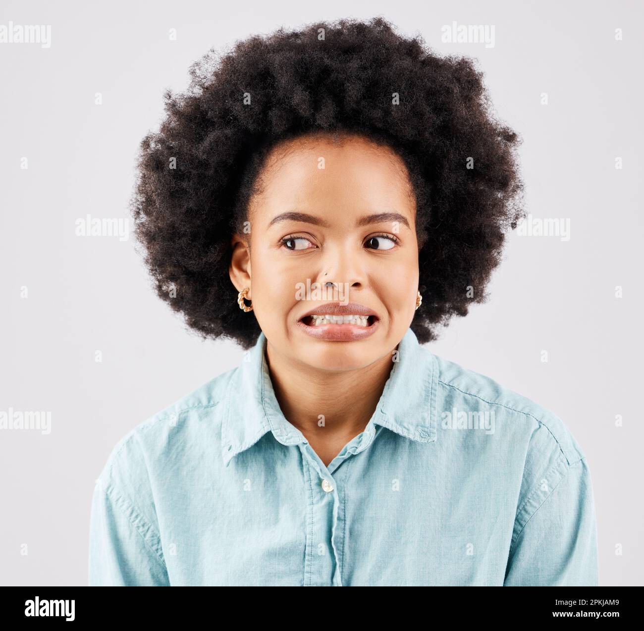 Black woman, afro and oops face in studio with comic expression for ...