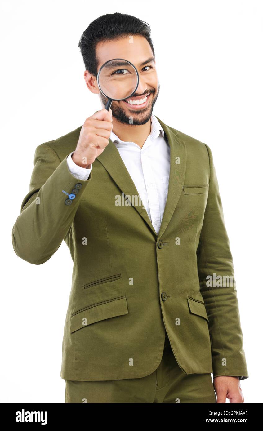 Portrait, investigator and Asian man with magnifying glass, happy and ...