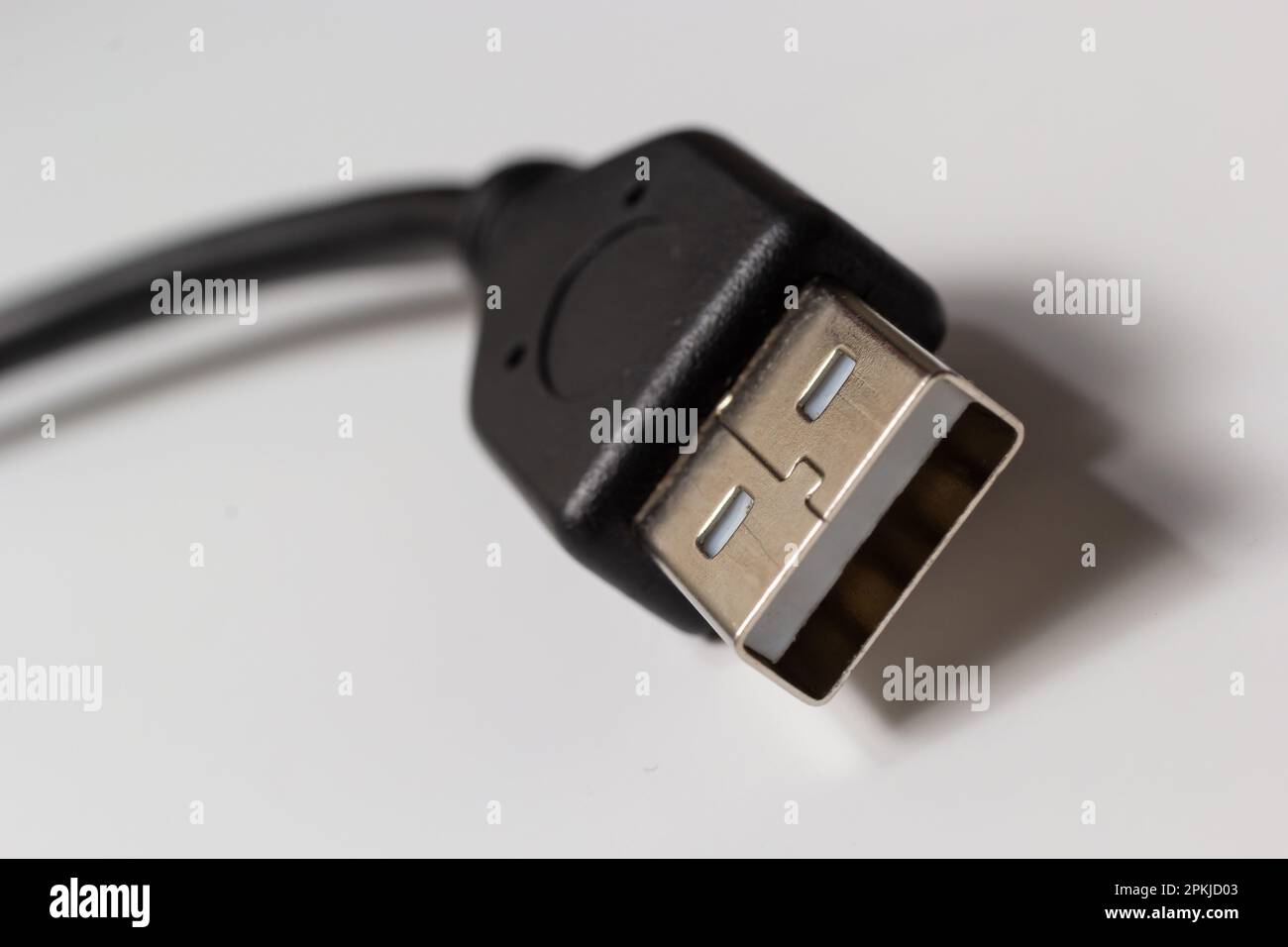 Close up of USB cable on white background. Data transfer technologies ...