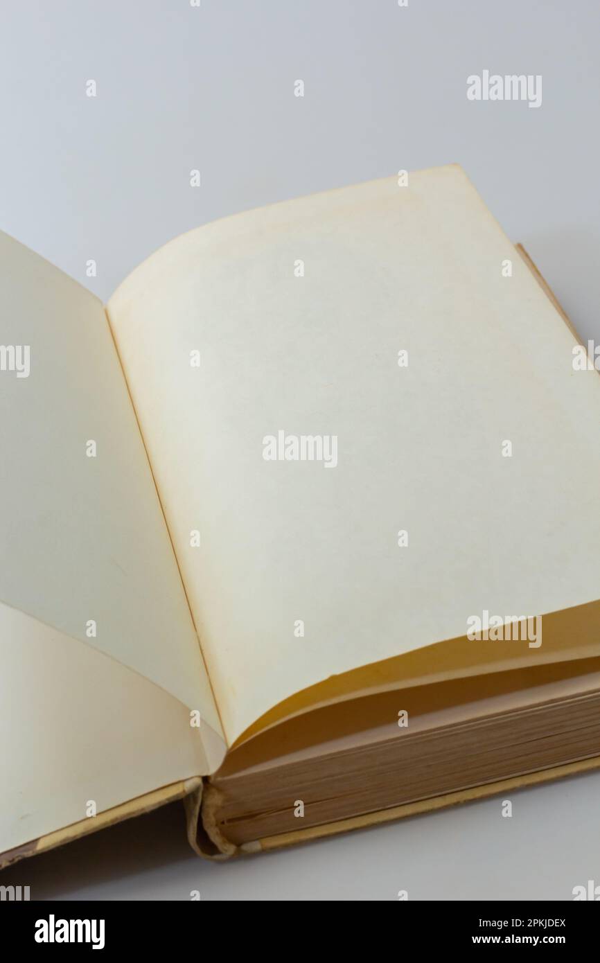 Open old book with blank pages and free space for text. The concept of ...