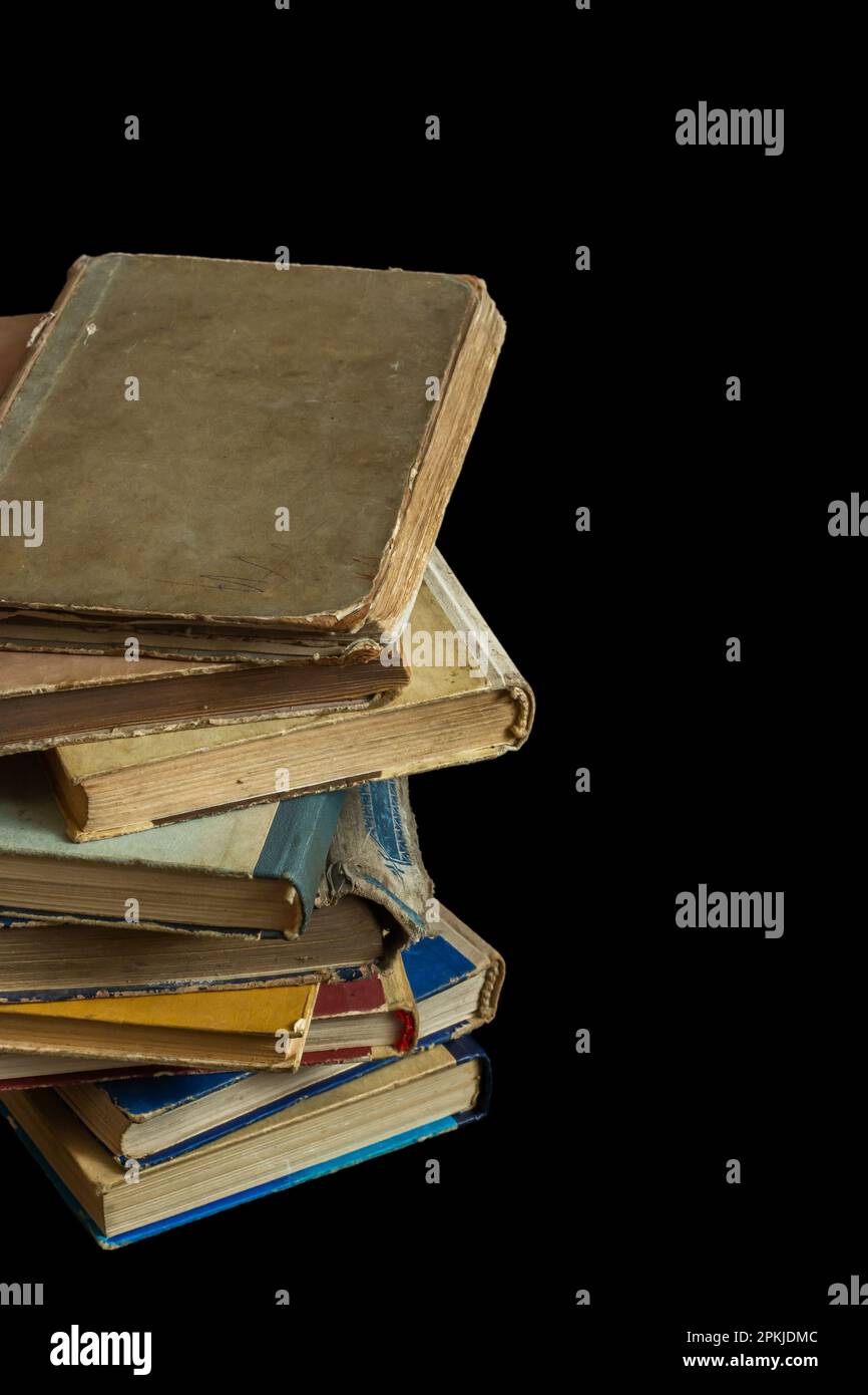 Book background. Stack of books in the library. Old yellow pages of ...