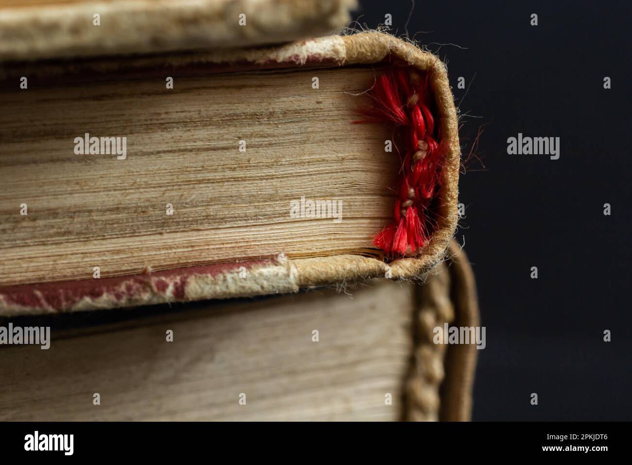 Book background. Stack of books in the library. Old yellow pages of ...