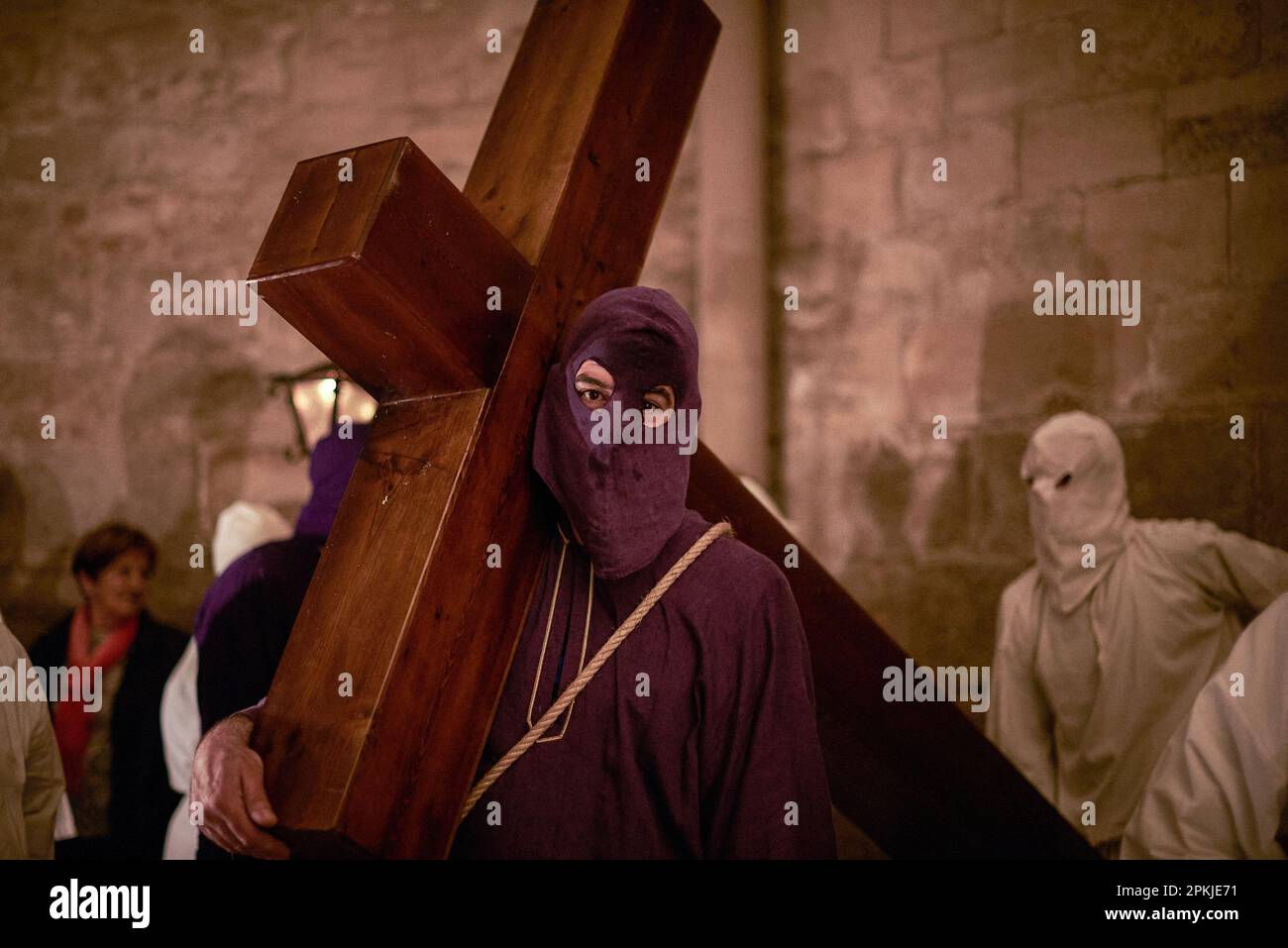A penitent from the "Santa de la Vera Cruz" brotherhood participates in ...