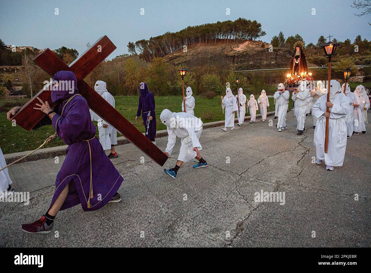 A penitent from the Brotherhood of the “Santa de la Vera Cruz” carries ...