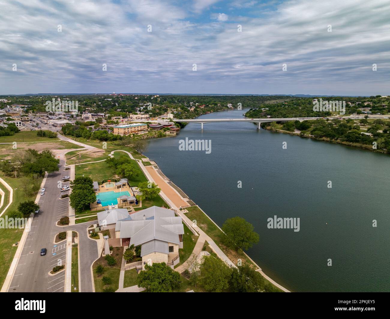 An aerial view of bustling cityscape, Marble Falls Bridge, Lake Marble ...