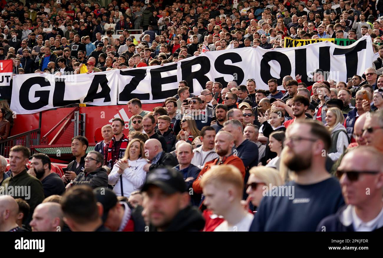 Manchester United fans with Glazers Out banners in the stands during ...