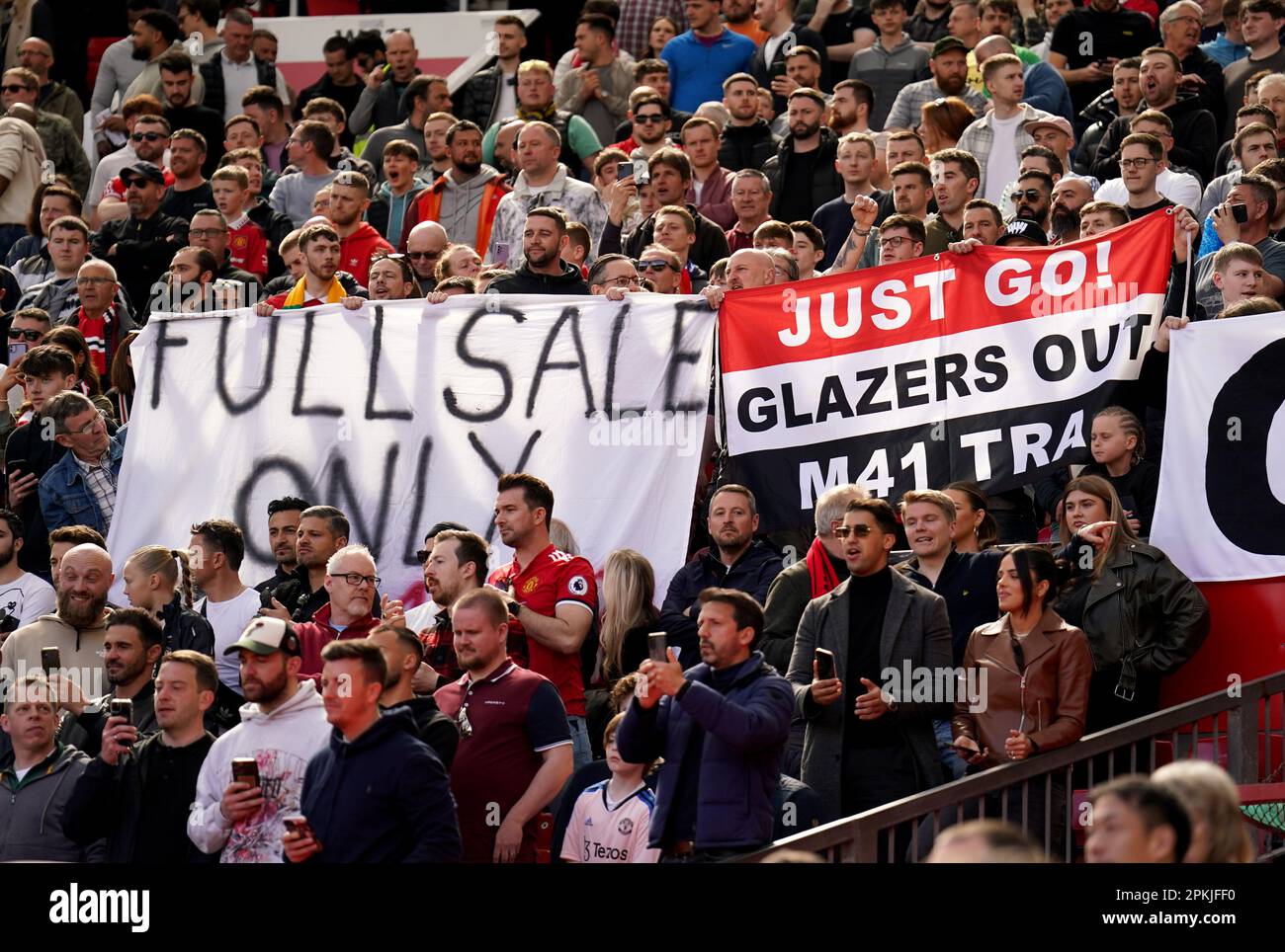 Manchester United fans with Glazers Out banners in the stands during ...