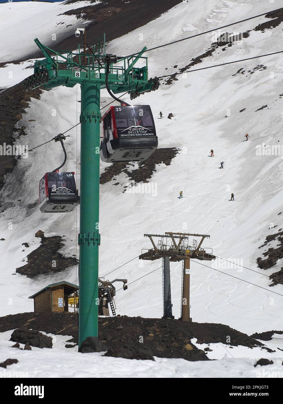 ski mountaineering on steep slope of Mount Etna in winter National Park ...