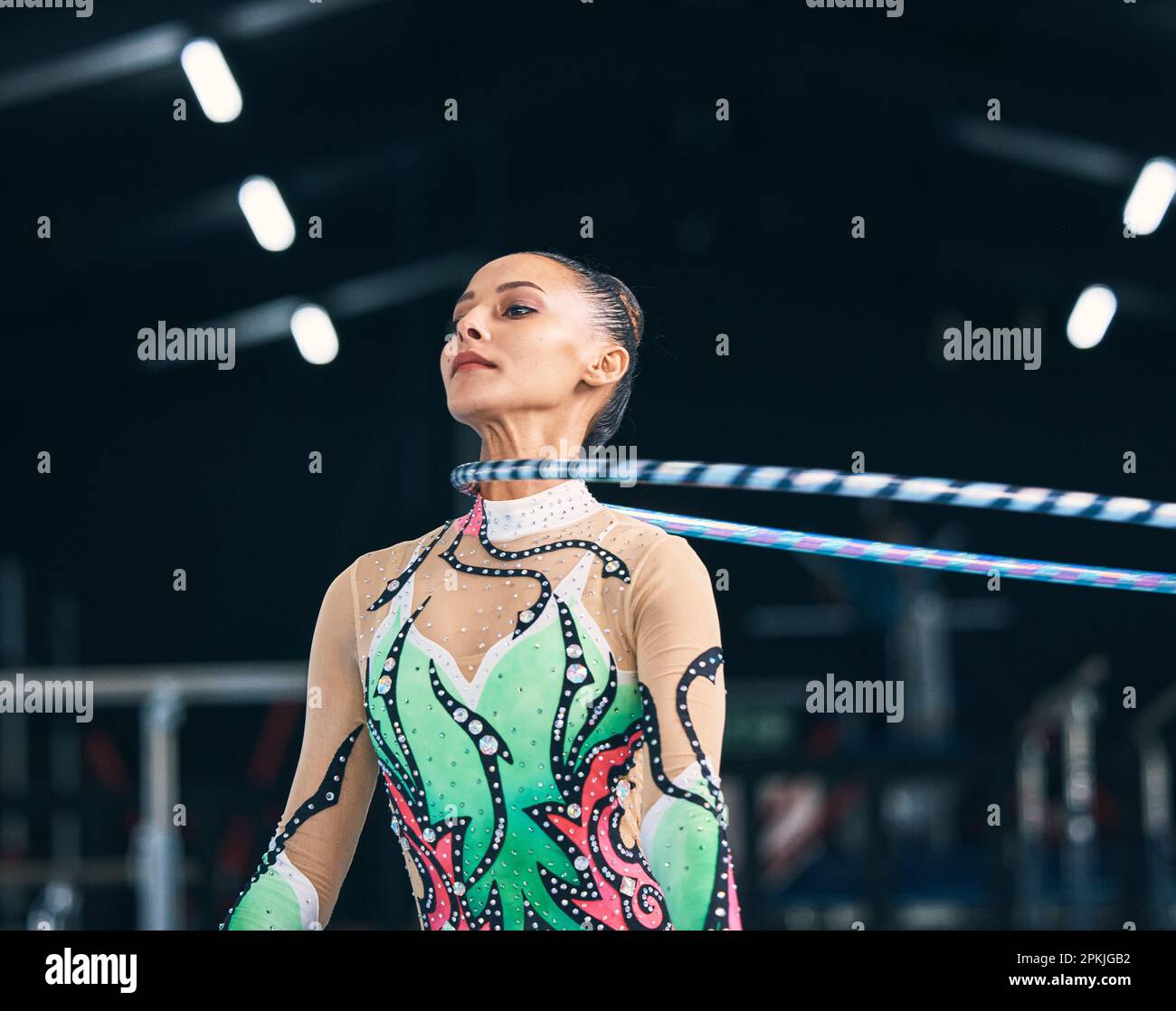 Woman, gymnastics and spinning hoop on neck for competition, sports ...