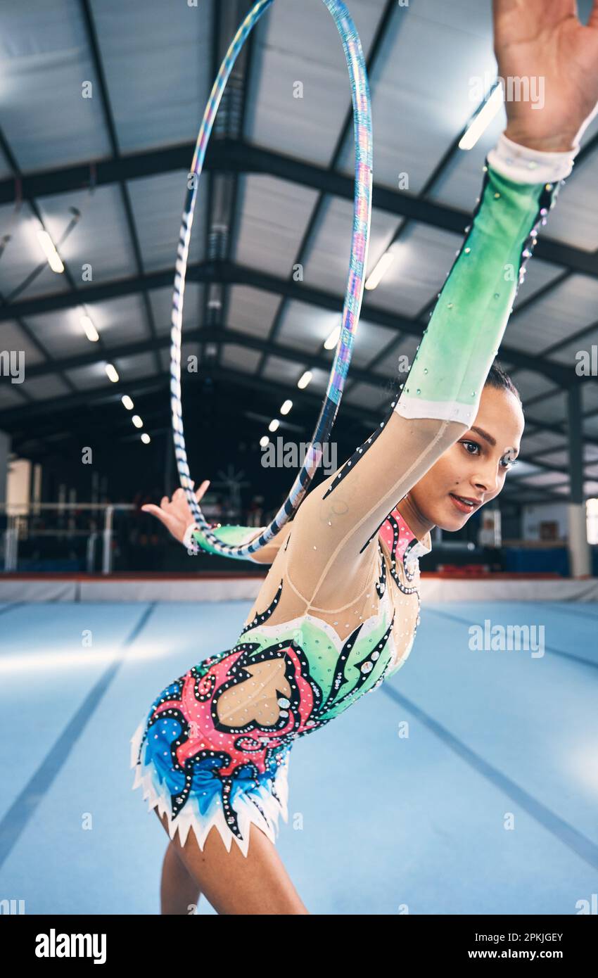 Woman, gymnastics and hoop for competition, sports training and dancing ...