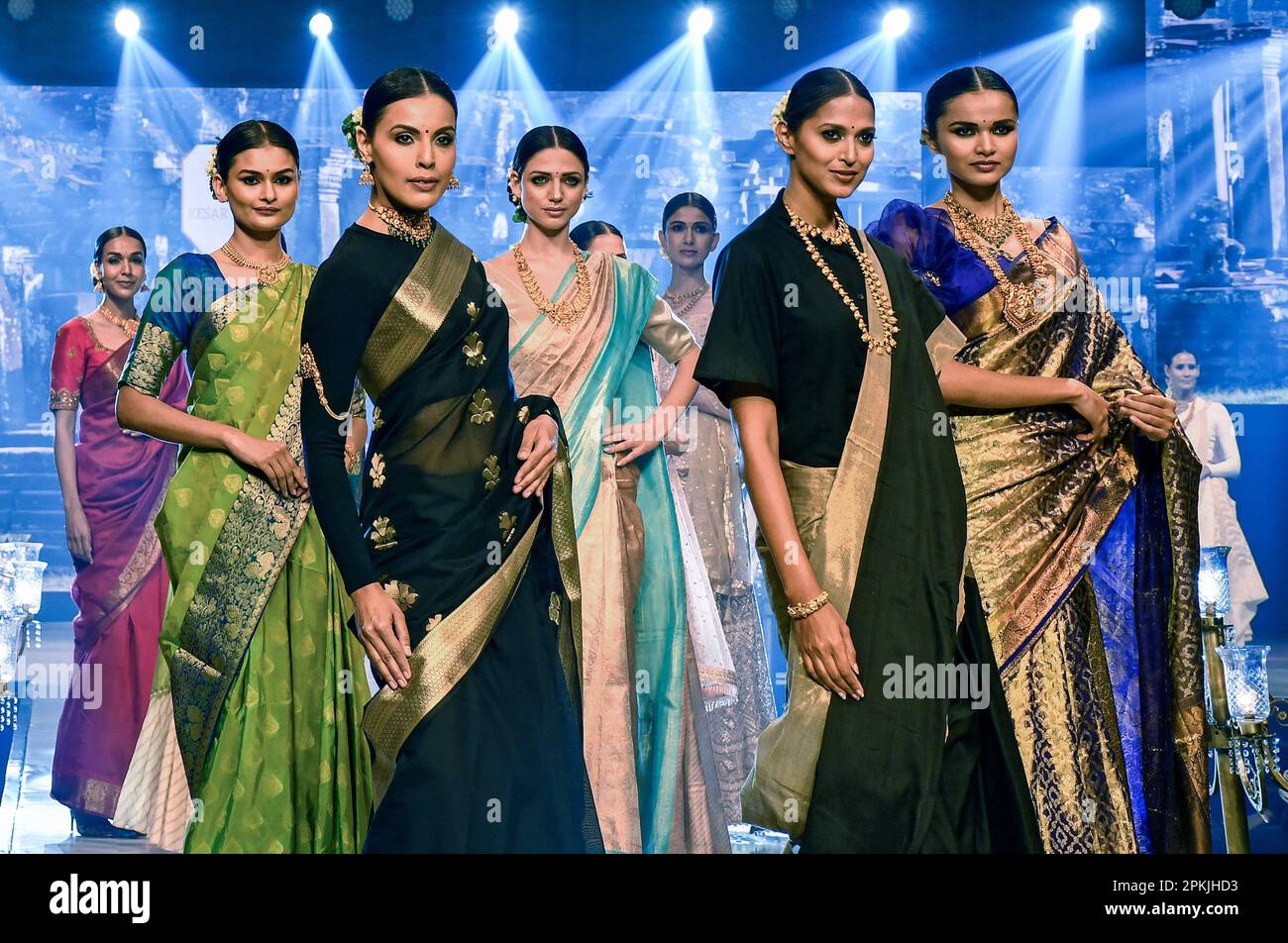 Mumbai, India. 07th Apr, 2023. Models dressed in a saree and wearing ...