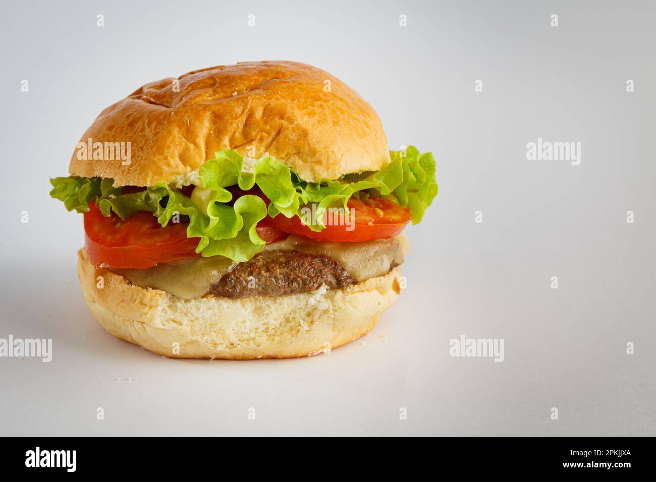 Fresh hamburger on white background - front view and side space Stock ...