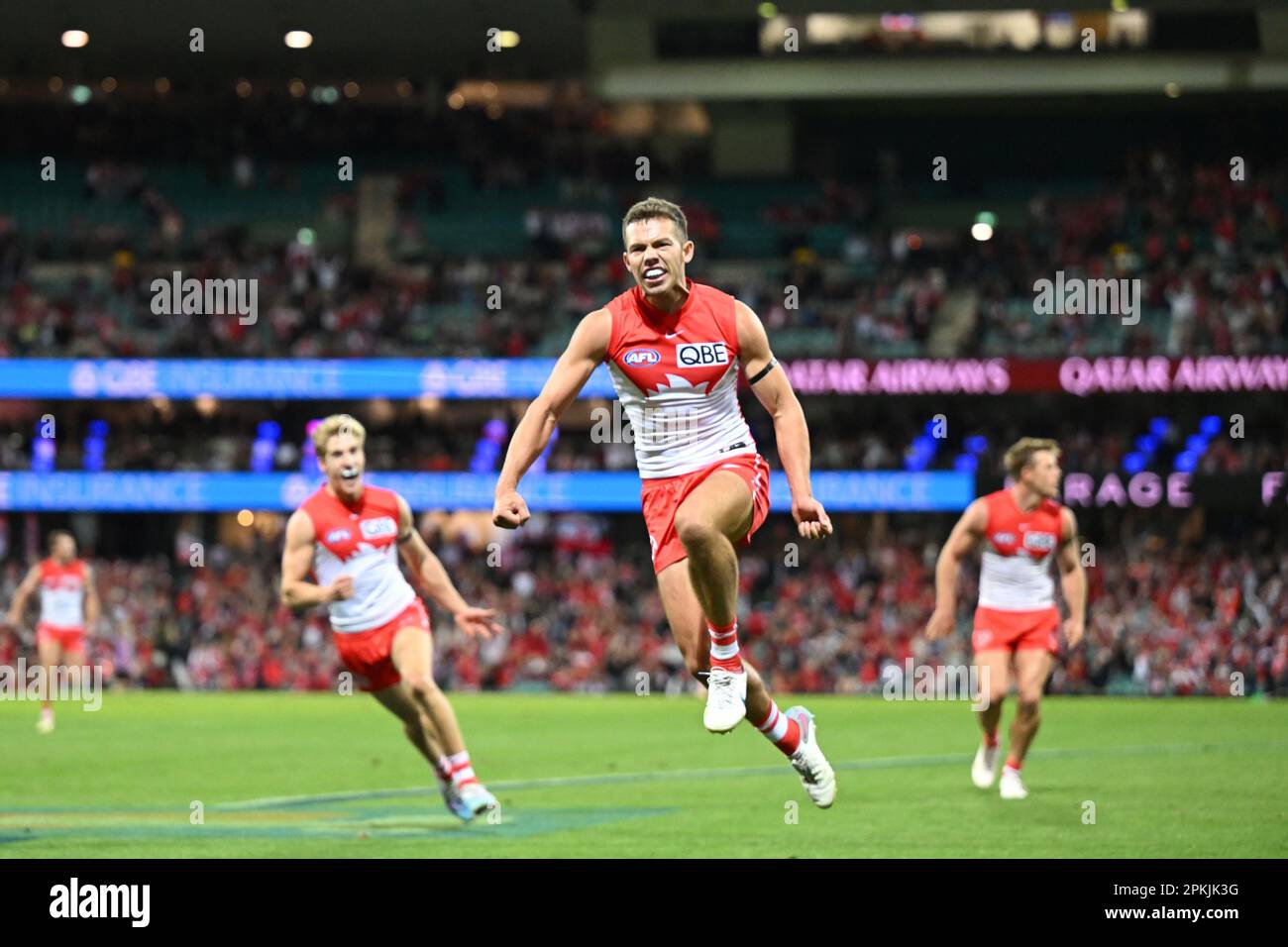 Oliver Florent of the Swans celebrate prematurely as he is denied his ...