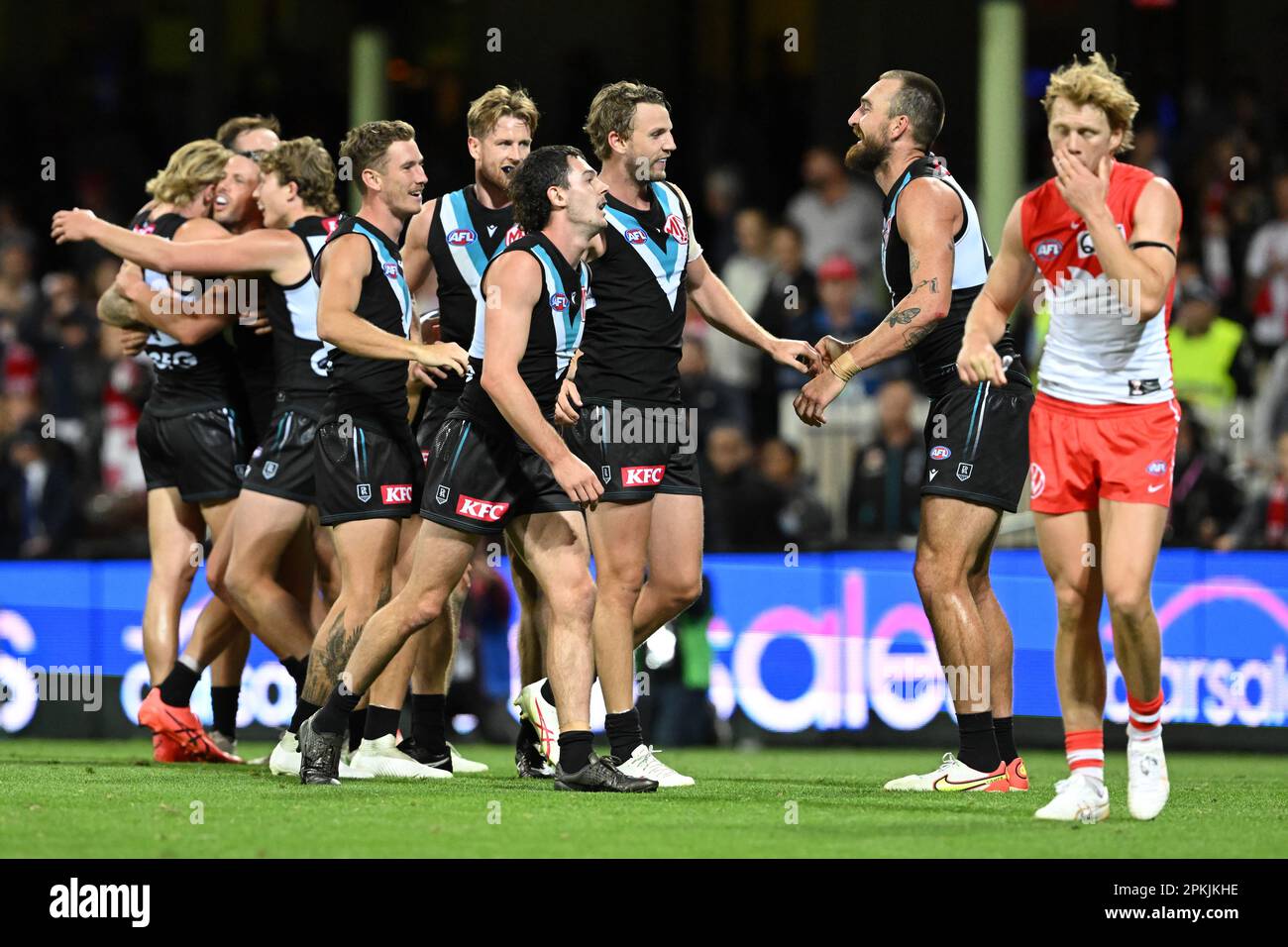 The Power celebrate foloowing their win over the Swans during the AFL ...
