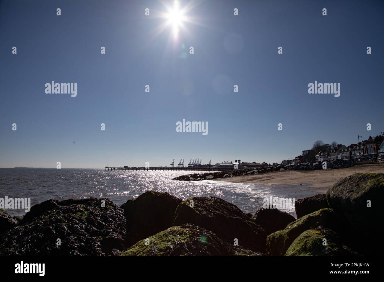 Felixstowe beach with the Port of Felixstowe in the distance Stock ...