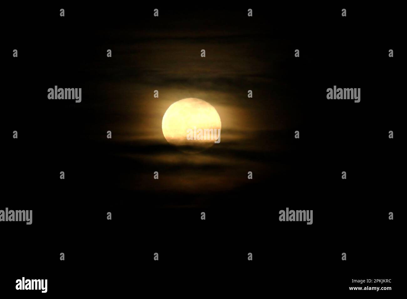 Bright full moon on cloudy hi-res stock photography and images - Alamy