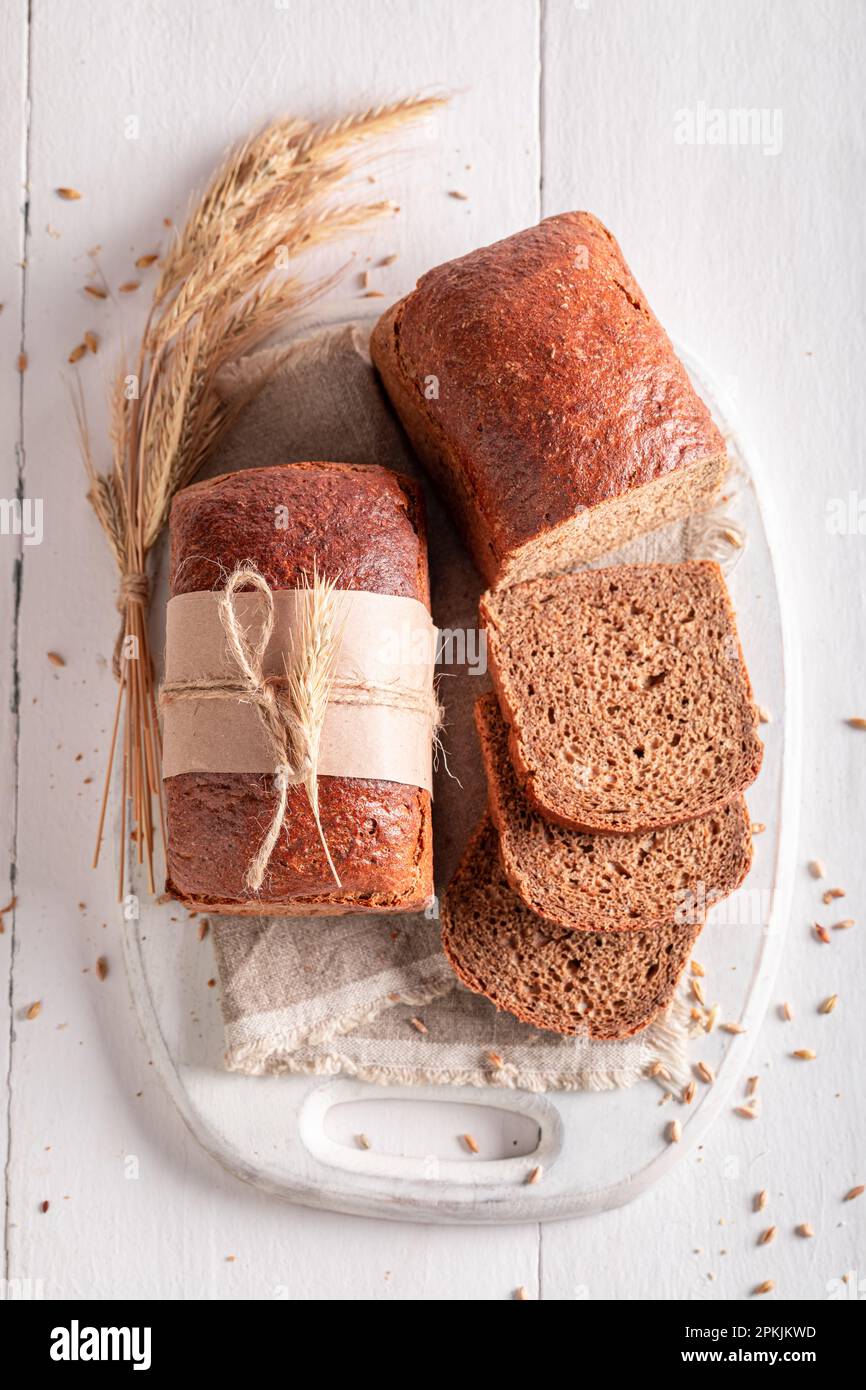 Rustic loaf of breads baked in home bakery. Homemade bread in the ...