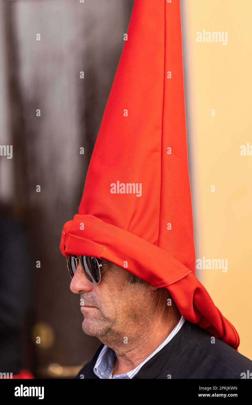 Puente Genil, Spain. 07th Apr, 2023. A Nazareno wearing a cone-shaped ...