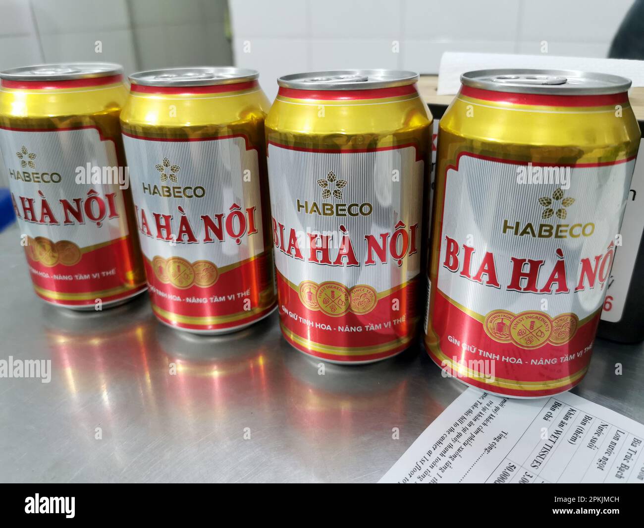 26 February 2023, Vietnam, Hanoi: Cans of Hanoi brand beer are on a ...