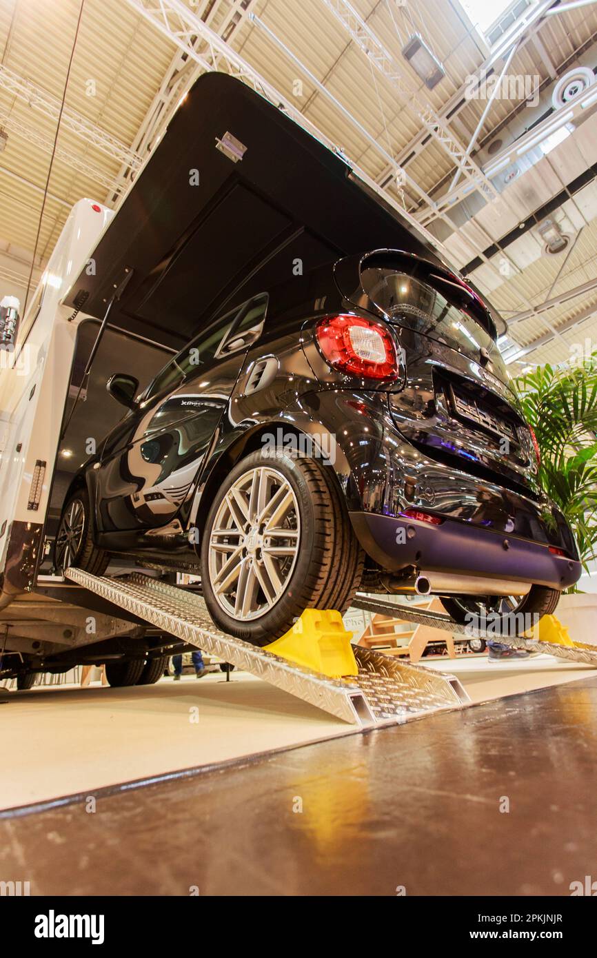 ESSEN, GERMANY - FEBRUARY 21: A Smart car is demonstrated being winched ...