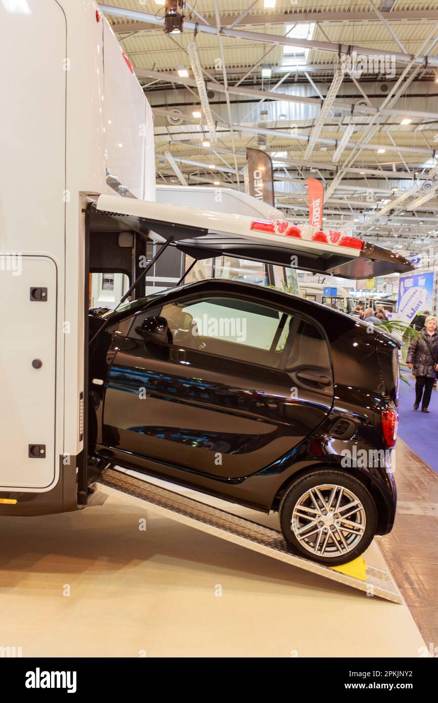 ESSEN, GERMANY - FEBRUARY 21: A Smart car is demonstrated being winched ...