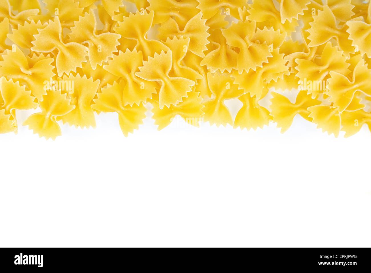 Farfalle spaghetti pattern, food background. Scattered raw pasta ...