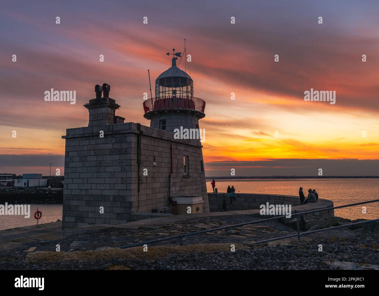 Red sunset sky at Howth Lighthouse Stock Photo - Alamy