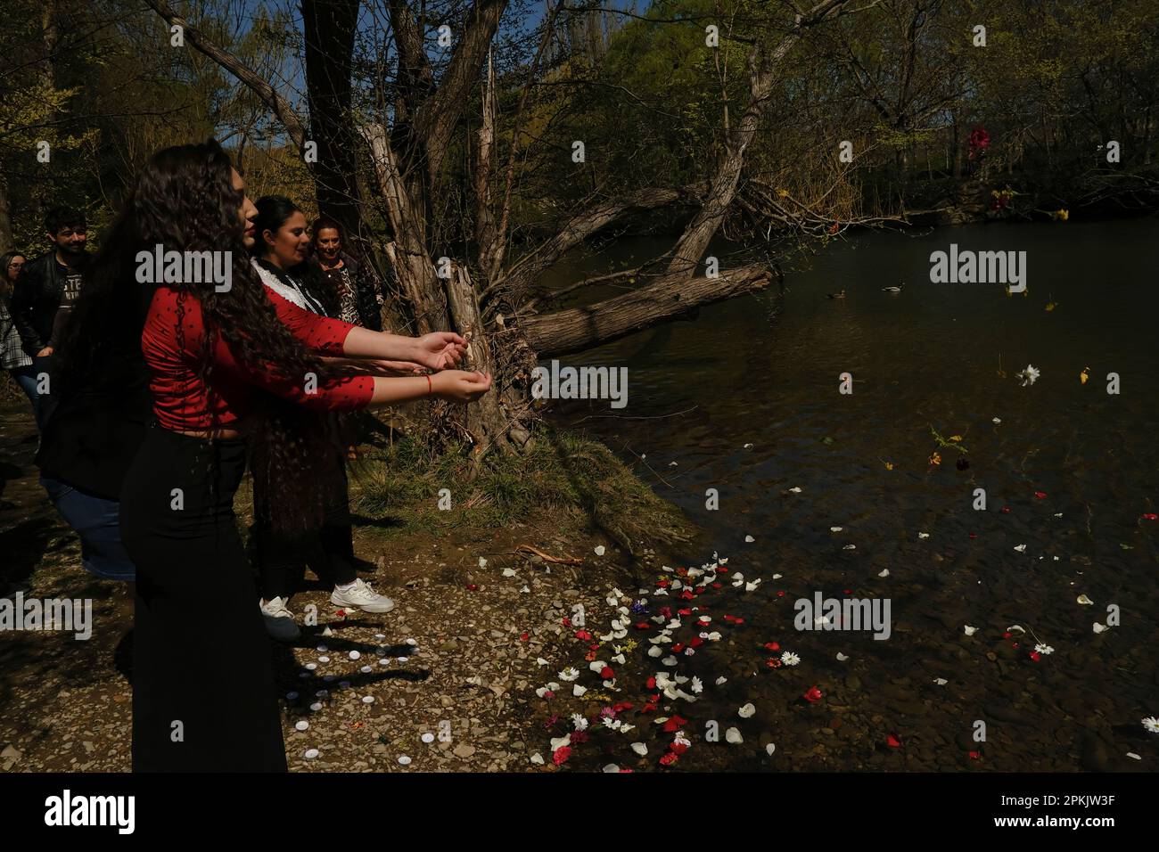 Spanish gypsy Yessica Borja, 19, throws flowers into a river in memory ...
