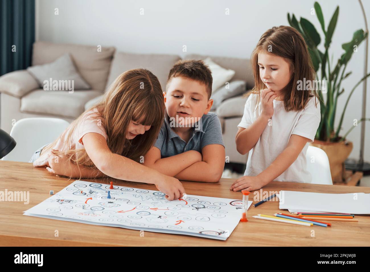 Step by step game. Kids having fun in the domestic room at daytime ...