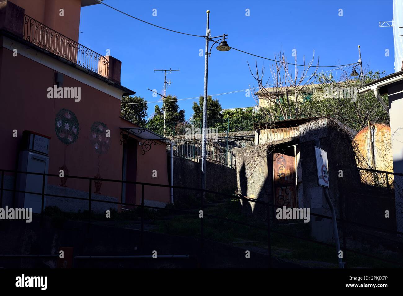 Corner of a cobbled alley in the shade in a town by the seaside Stock ...