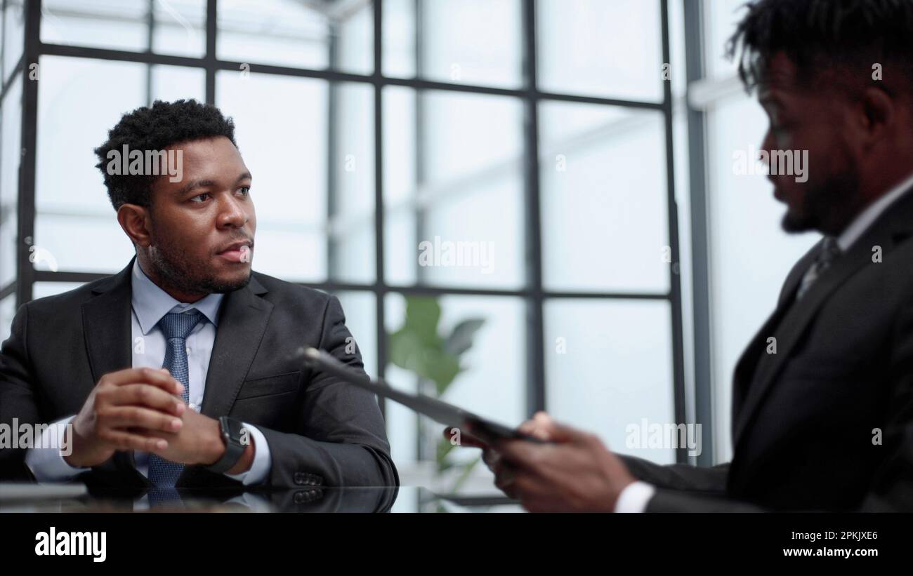 two African Americans signed a cooperation agreement Stock Photo - Alamy
