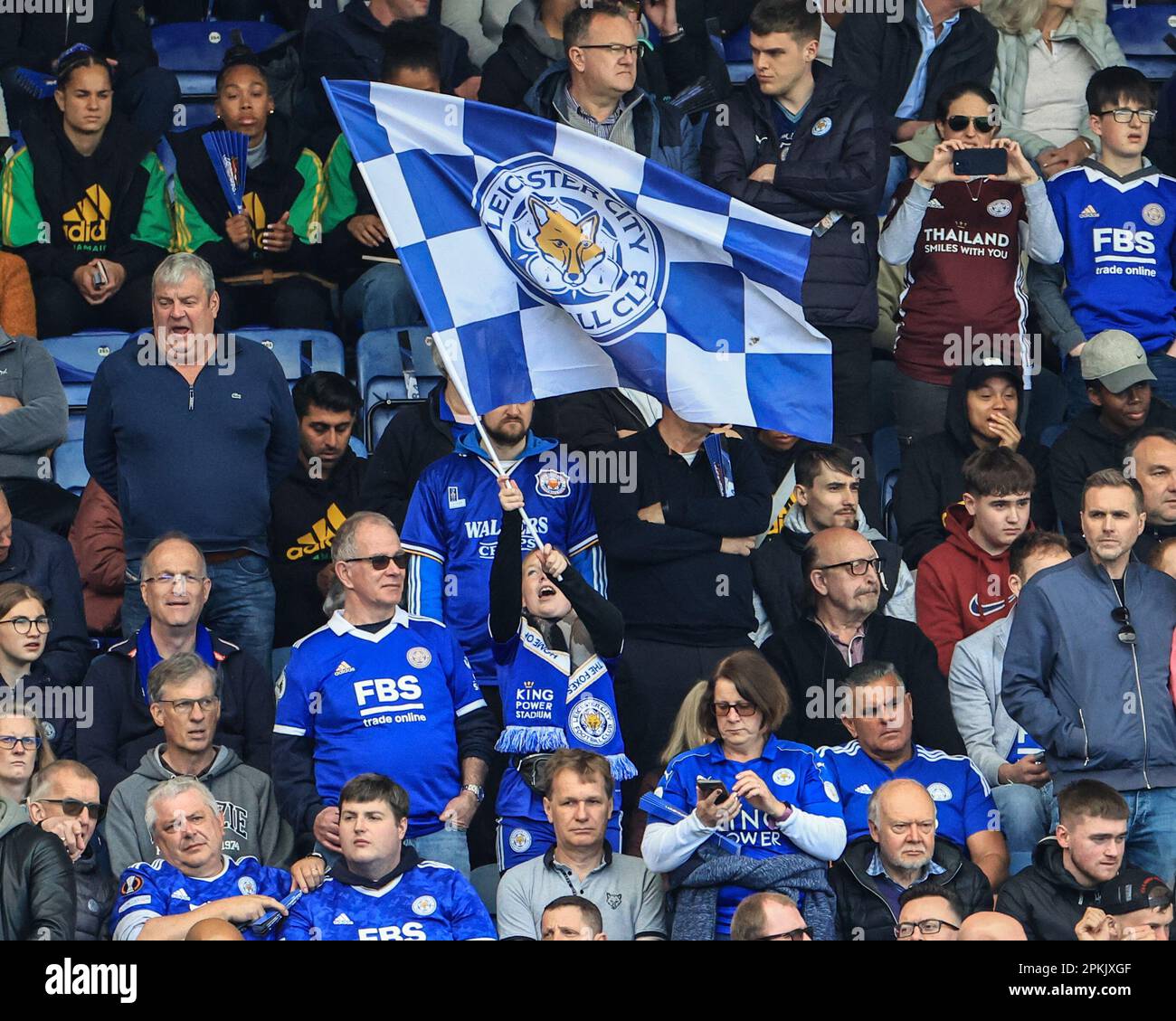 A Leicester fan waves a flag during the Premier League match Leicester ...