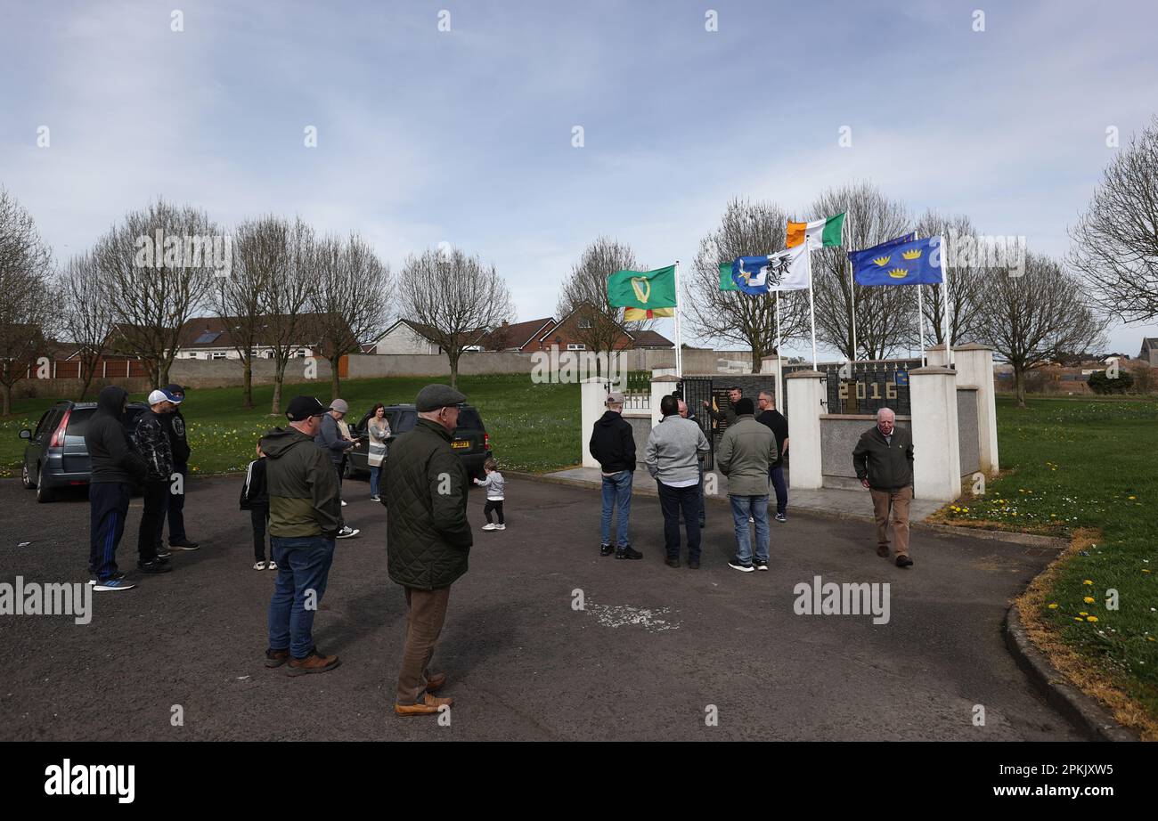 Pepole at the Edward Costello Memorial during an Easter commemoration ...