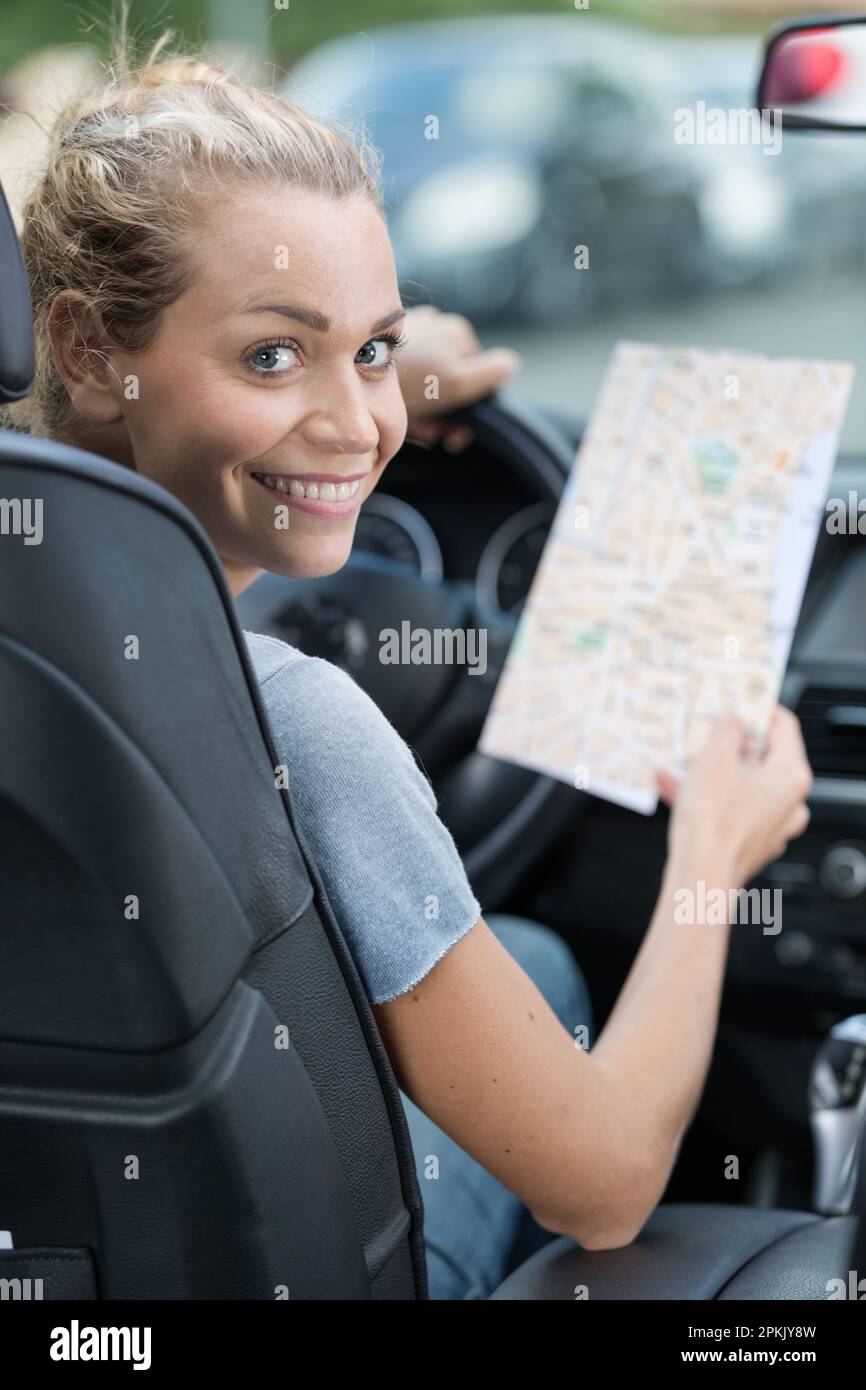 Car driving over map hi-res stock photography and images - Alamy