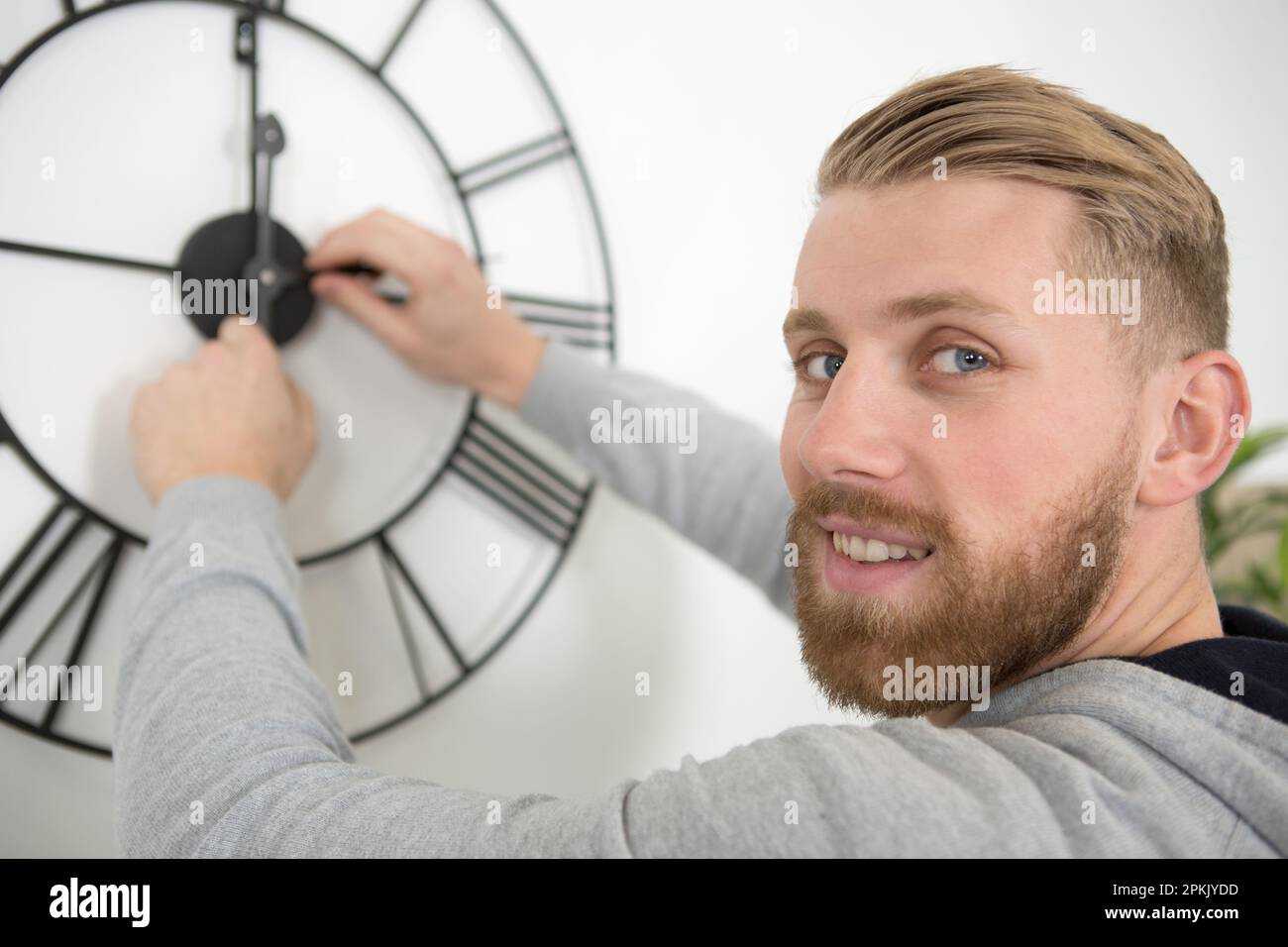 Setting the time hi-res stock photography and images - Alamy