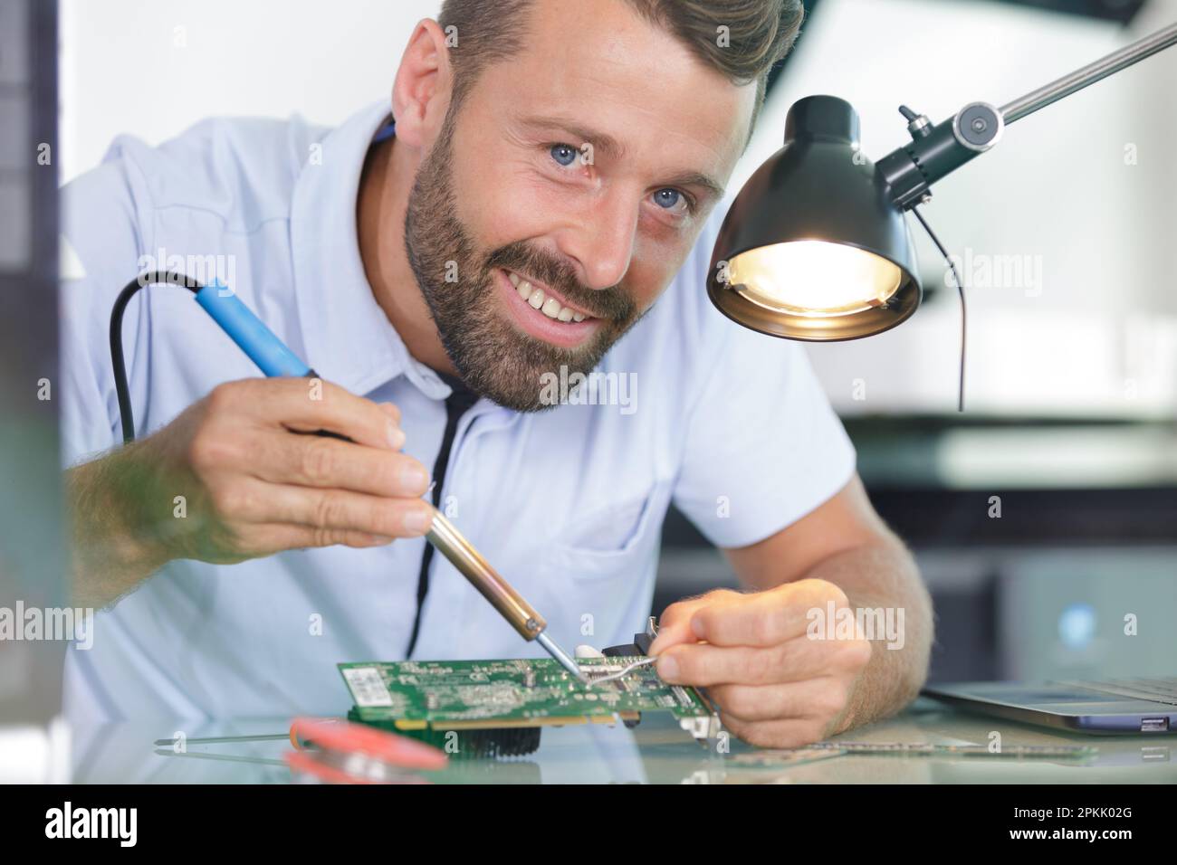 Man soldering hi-res stock photography and images - Alamy