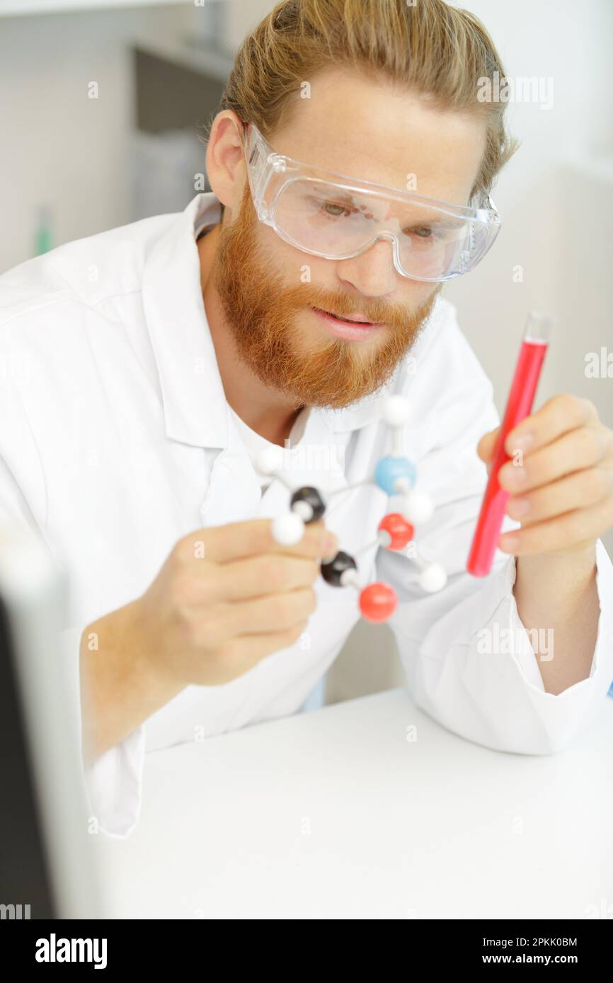 biologist takes the dna of various substances Stock Photo - Alamy