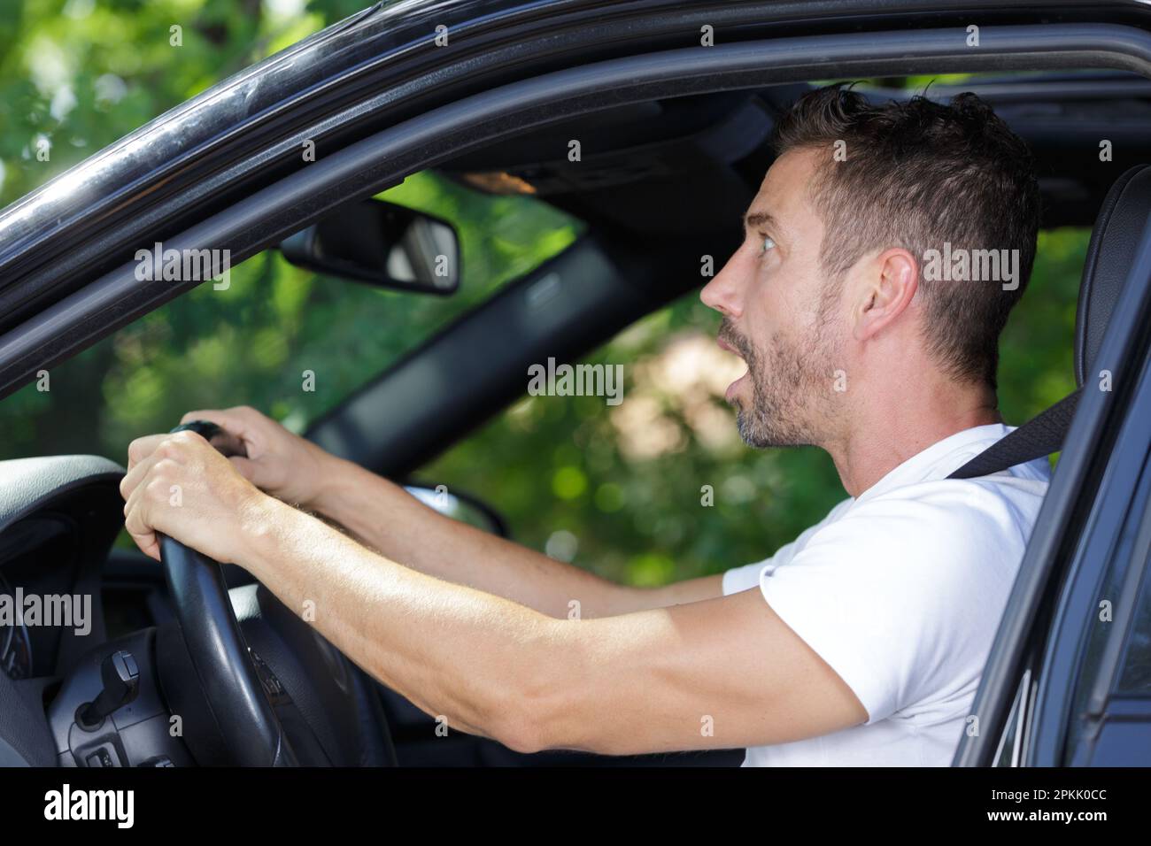 scared and shocked male driver Stock Photo - Alamy