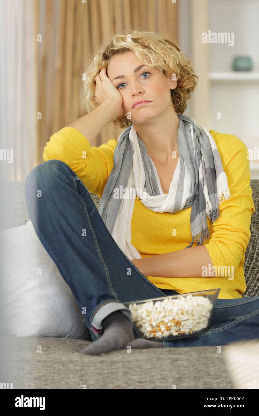 portrait of blond woman with boring look Stock Photo - Alamy