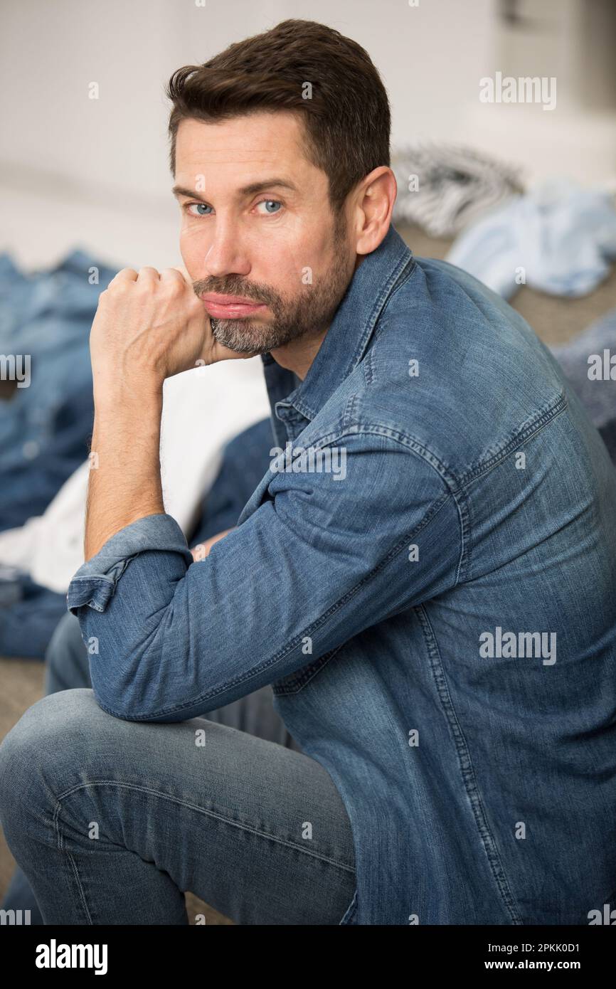 tired bored man looking in distance Stock Photo - Alamy