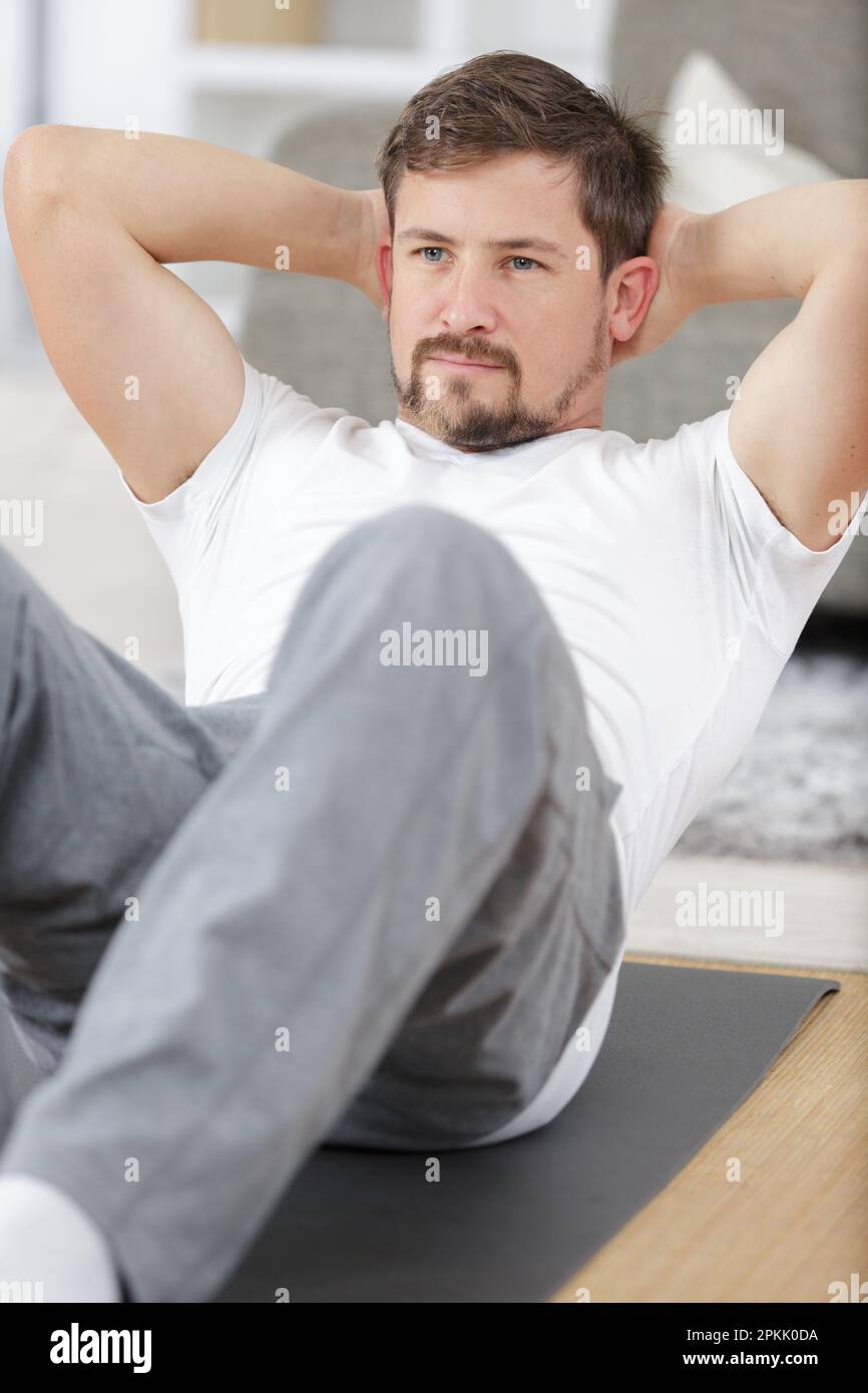 Stomach crunch hi-res stock photography and images - Alamy