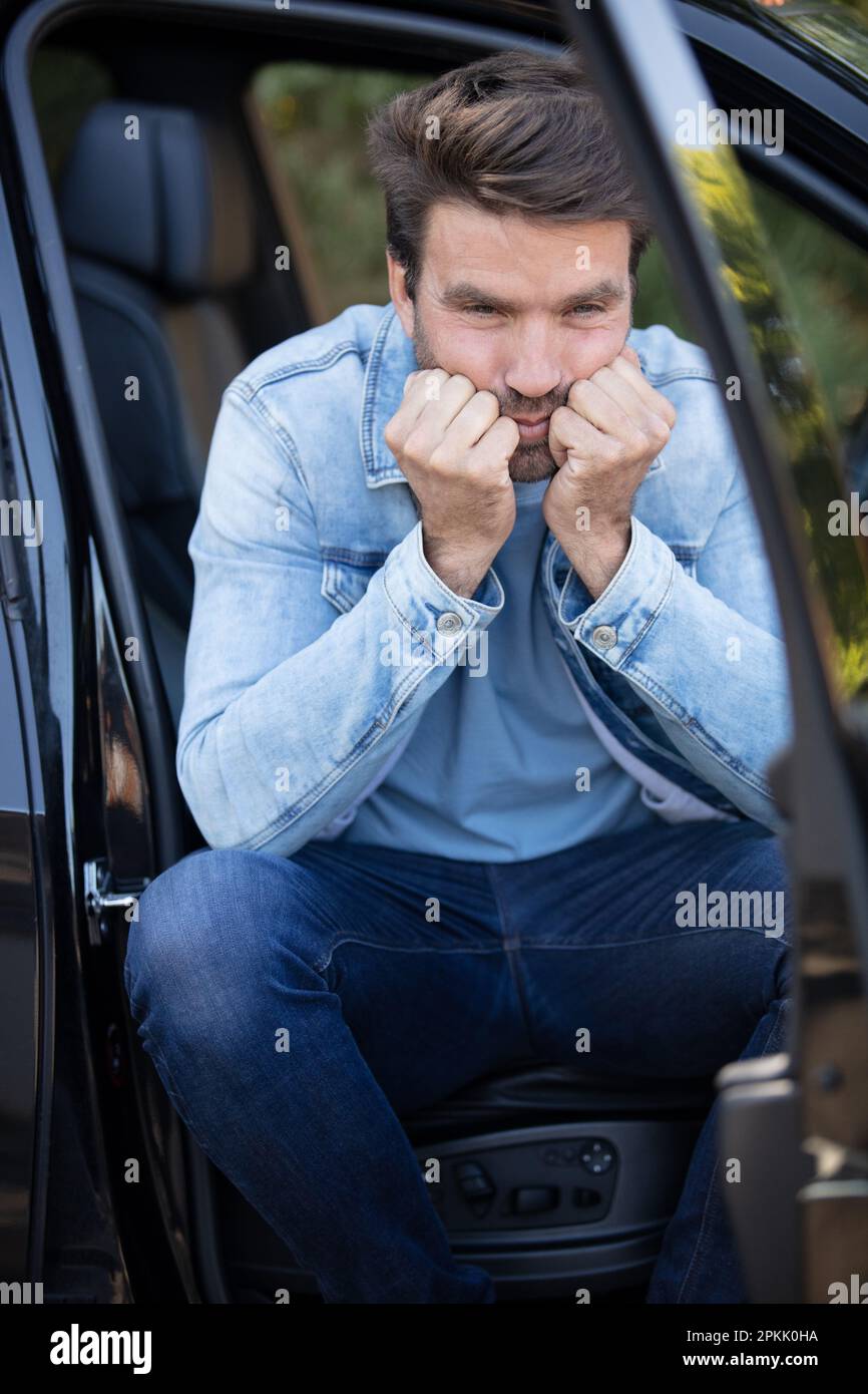 upset driver man in front of automobile crash car accident Stock Photo ...