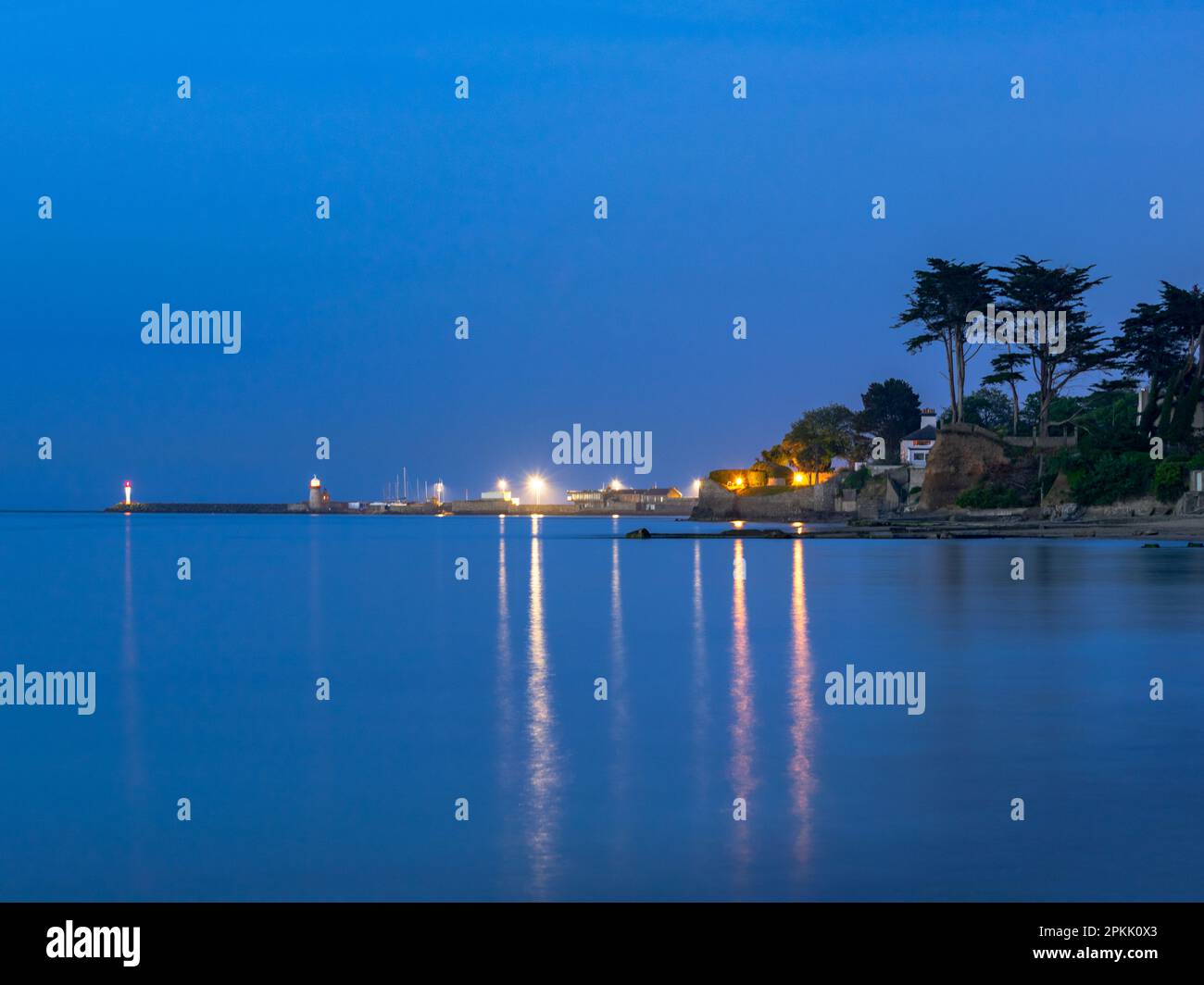 Nightfall reflections of Burrow Beach and Howth Stock Photo - Alamy