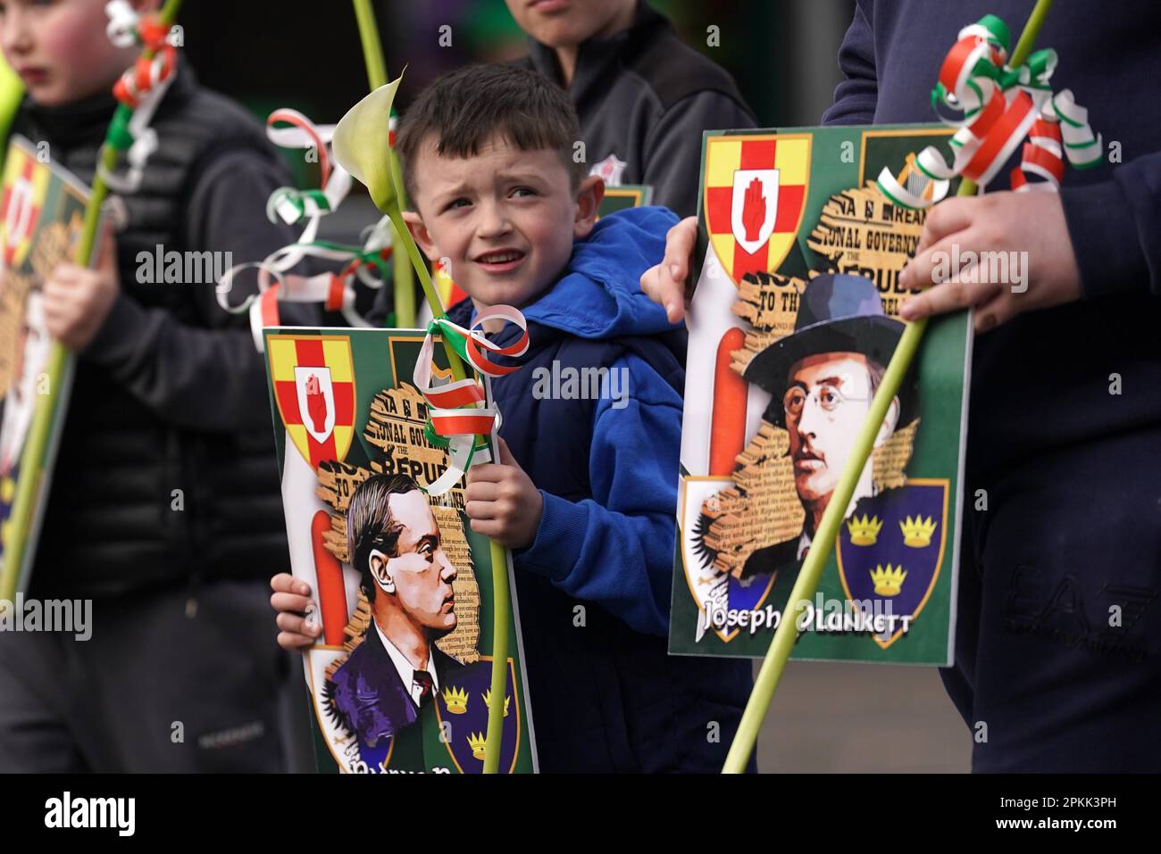 People during an Easter commemoration parade in Belfast. Easter parades ...