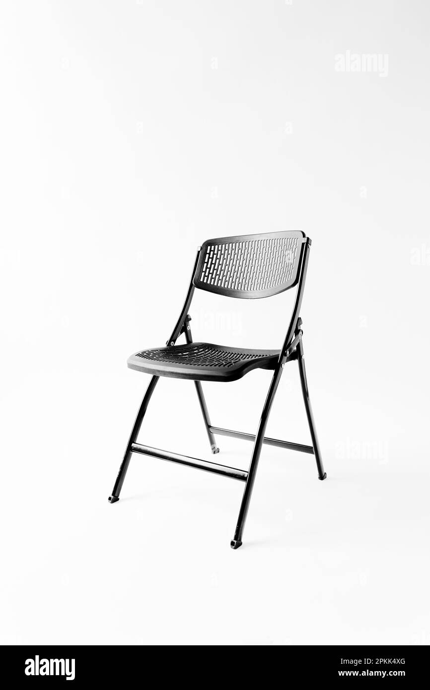 Modern black chair isolated on white Stock Photo - Alamy