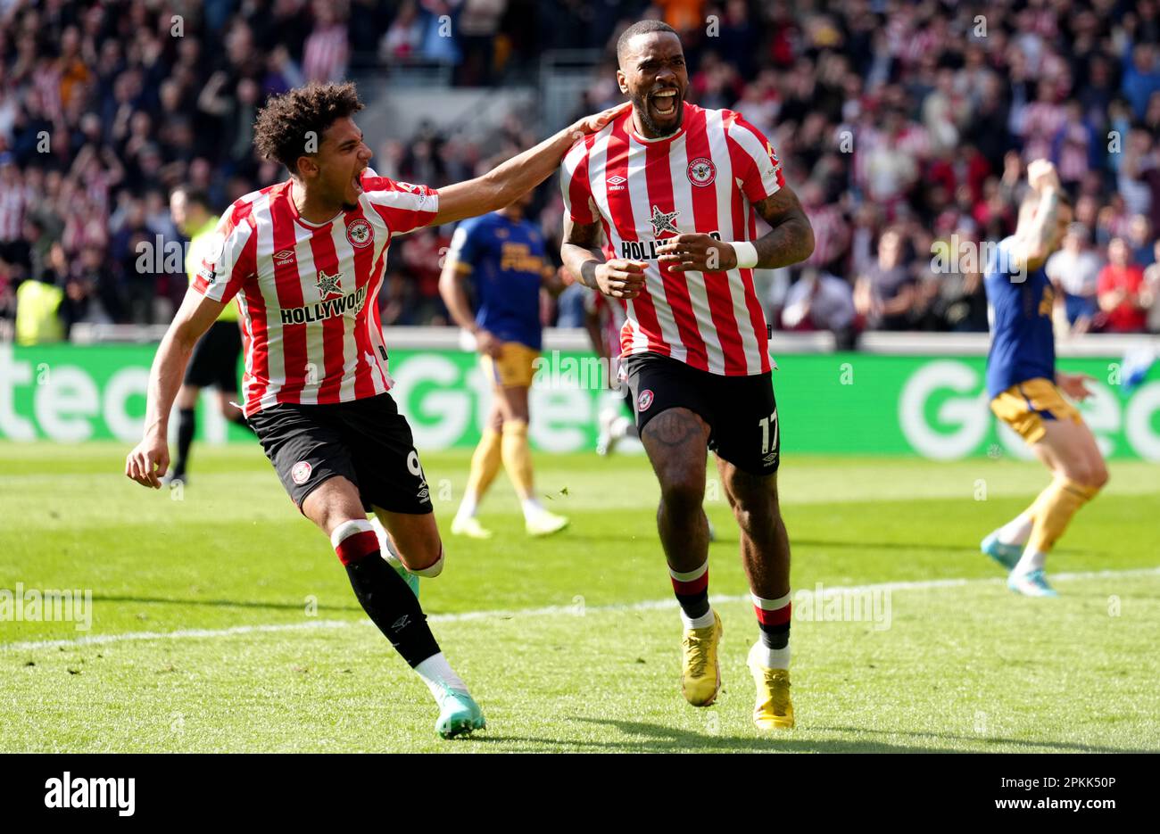 Brentford's Ivan Toney (right) celebrates scoring the opening goal from ...